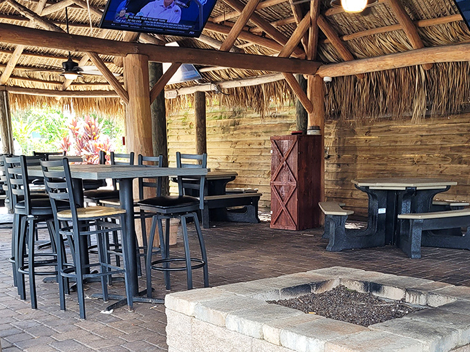 Florida's version of al fresco dining: thatched roof, fire pit, and just enough shade to keep your beer cold. Paradise found in Avon Park.