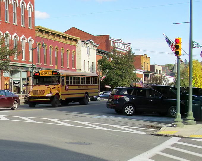 The yellow school bus navigating Main Street reminds visitors that Brookville is a living community, not just a picturesque backdrop for weekend getaways.