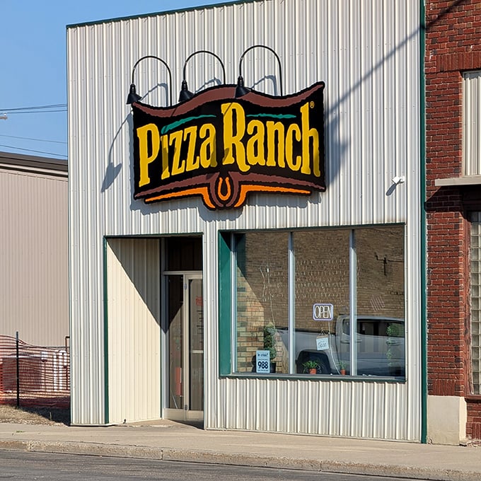 Pizza Ranch's bold yellow sign promises comfort food that unites generations&mdash;because nothing brings families together like the universal language of pizza.
