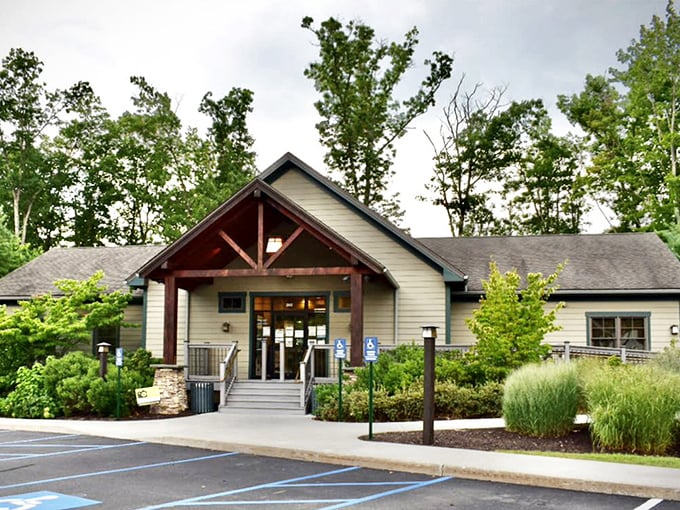 The Pocono Mountains Visitors Center welcomes travelers with rustic charm. That wooden entrance has launched thousands of memorable Pennsylvania adventures.
