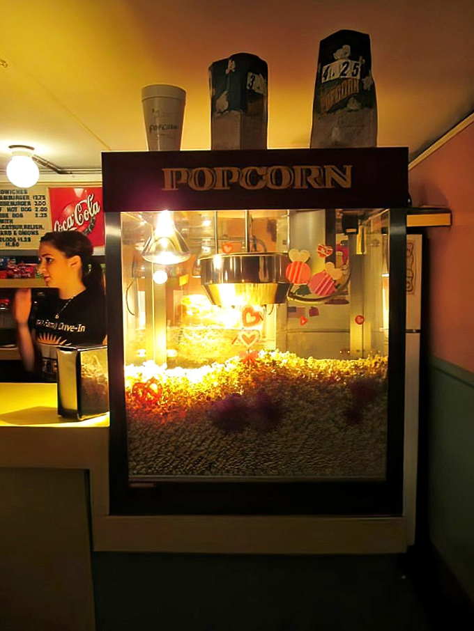 The beating heart of any drive-in: a popcorn machine that's been perfecting its craft longer than most streaming services have existed.