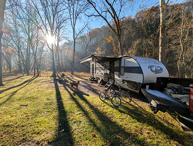 Morning light stretches across the campground, creating long shadows and promising another day of adventure in Ohio's outdoor paradise.