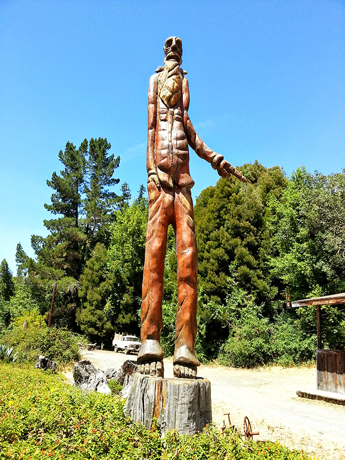 Tall tales carved in wood. This towering sculpture stands as a tribute to the human stories intertwined with these ancient forests.