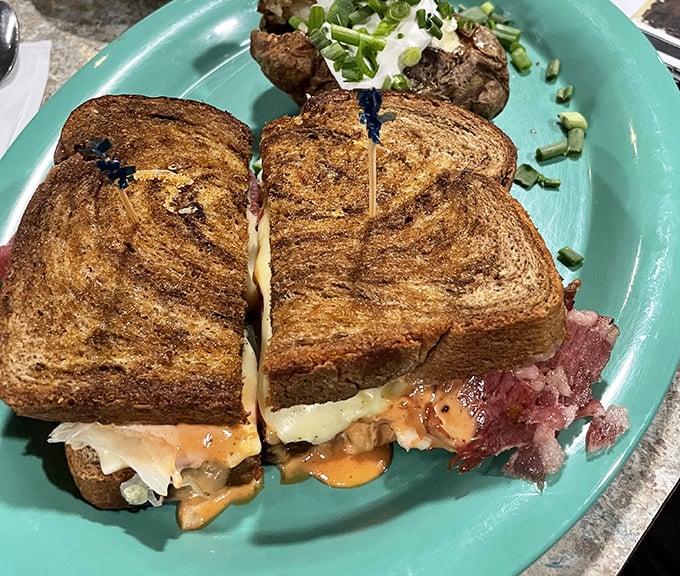 A proper Reuben should require both hands and several napkins. This beauty, with its melty cheese and grilled rye, delivers on that promise.