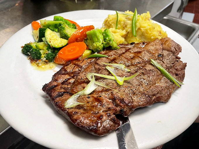 A steak that understands its purpose in life is to make you happy. Those vegetables are just along for the glorious ride.