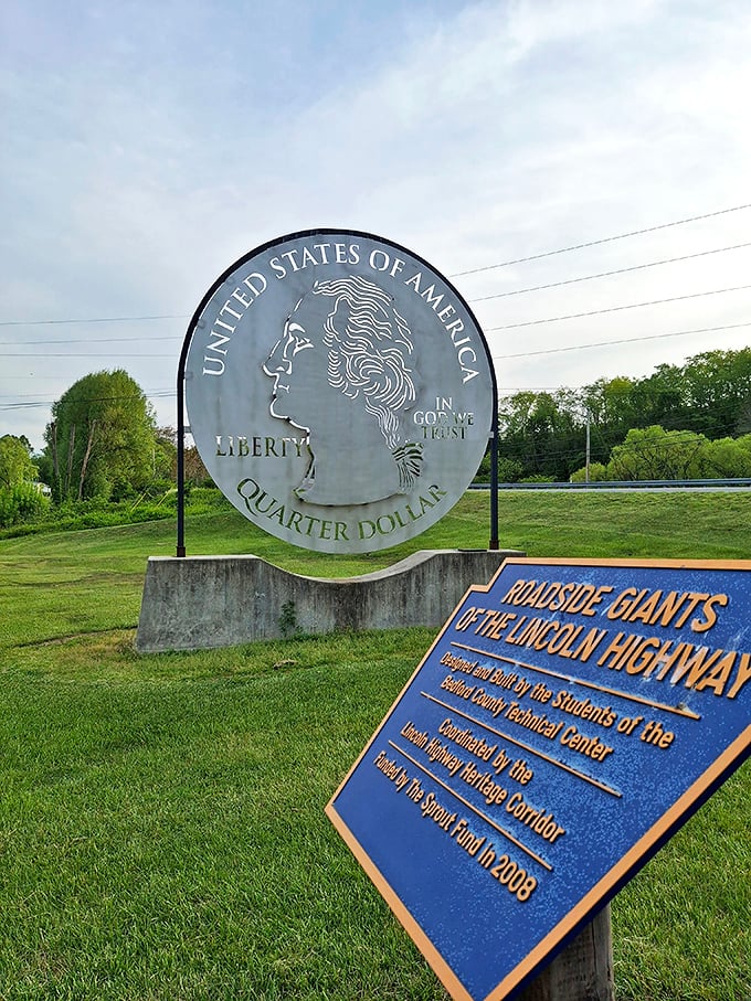 The combination of the quarter and its informational plaque creates a perfect educational pit stop along the historic Lincoln Highway.
