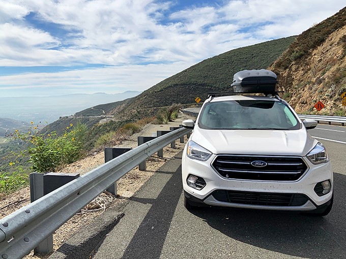 Road trip perfection: your chariot, the open road, and views that make you question why you ever spend time indoors.