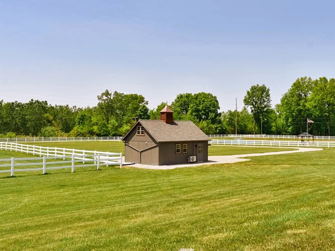 Postcard-perfect from every angle. The iconic barn with its distinctive cupola stands as the heart of Erinwood Farms' picturesque landscape.