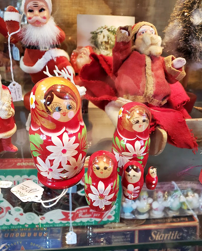 Russian nesting dolls share shelf space with vintage Santas, proving that childhood magic speaks a universal language.