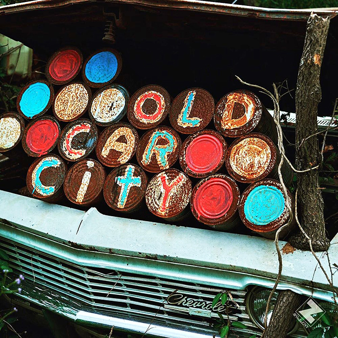 Even the grille of this Chevrolet becomes a canvas. Painted tin cans spell out "Old Car City" in a folk-art tribute to automotive Americana.