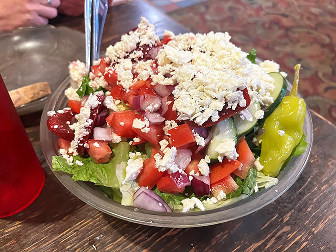 A Greek salad that doesn't apologize for being the healthy option. That feta cheese is saying, "Save room for pizza, but enjoy me now."