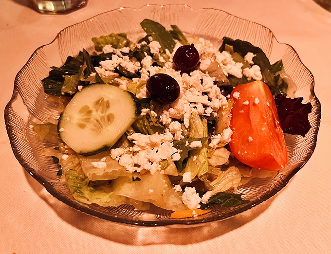 A Greek salad topped with feta that understands fresh vegetables deserve proper recognition and quality ingredients always.