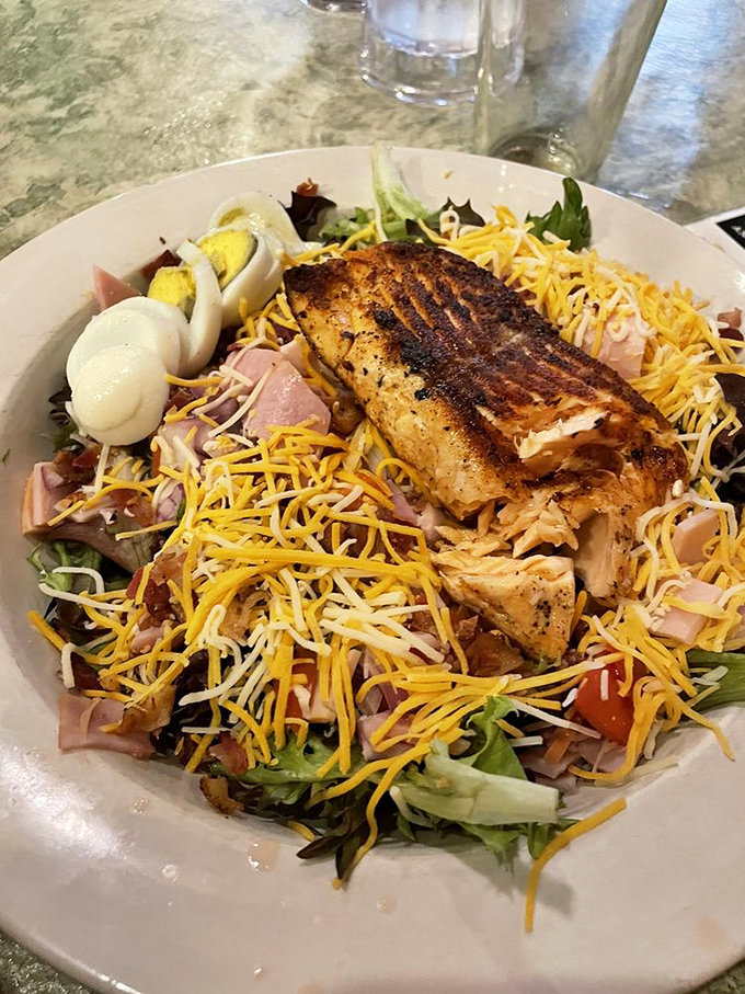 This isn't just a salad&mdash;it's a celebration of textures and flavors topped with perfectly grilled fish and enough cheese to make it worthwhile.