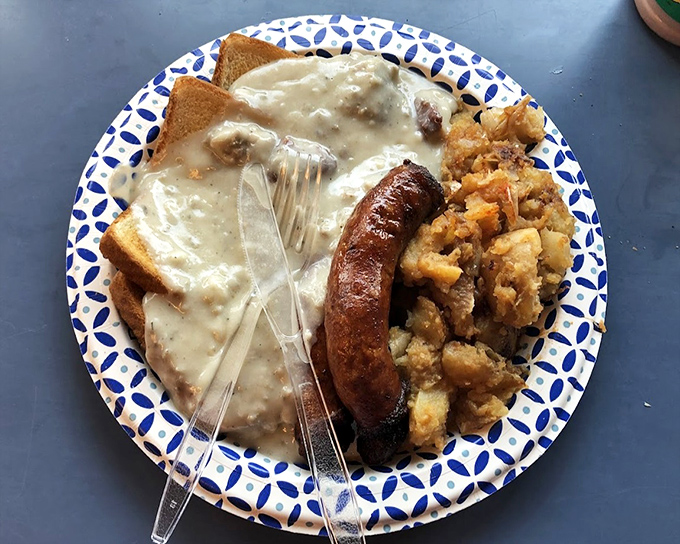 Sausage gravy that doesn't just cover the plate &ndash; it blankets your soul in comfort. Paired with home fries, it's the breakfast of champions.