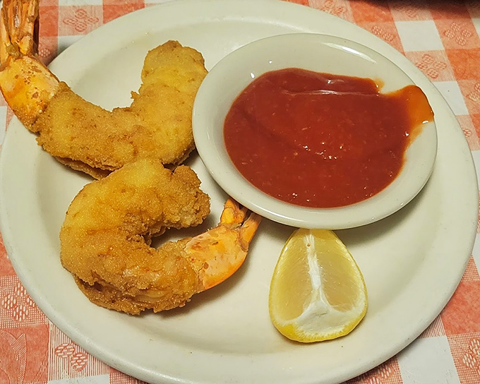 Fried shrimp with cocktail sauce and lemon&mdash;simple pleasures executed perfectly, proving that sometimes the classics need no improvement. 