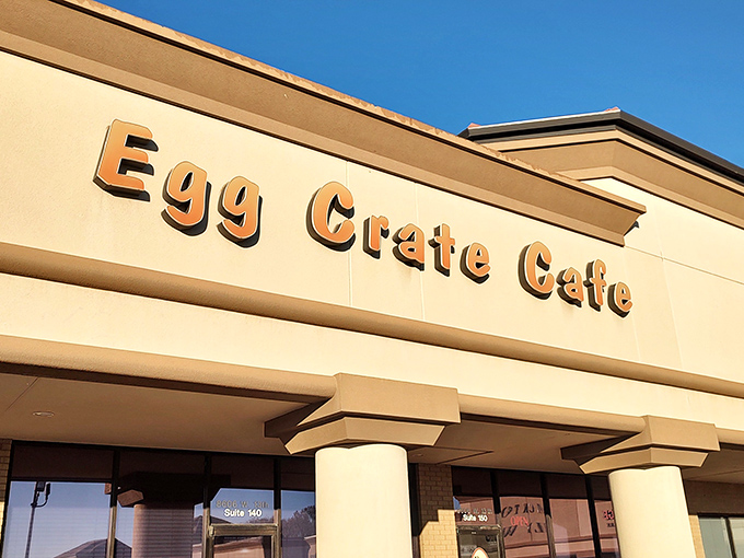The golden glow of morning sun highlights the Egg Crate sign like a beacon calling to all who understand that breakfast isn't just a meal, but a celebration.