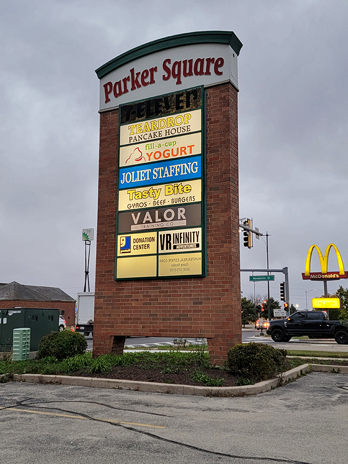 Nestled in Parker Square between pancakes and yogurt, Tasty Bite's humble sign proves that sometimes the best food experiences aren't shouting for attention&mdash;they're earning it.