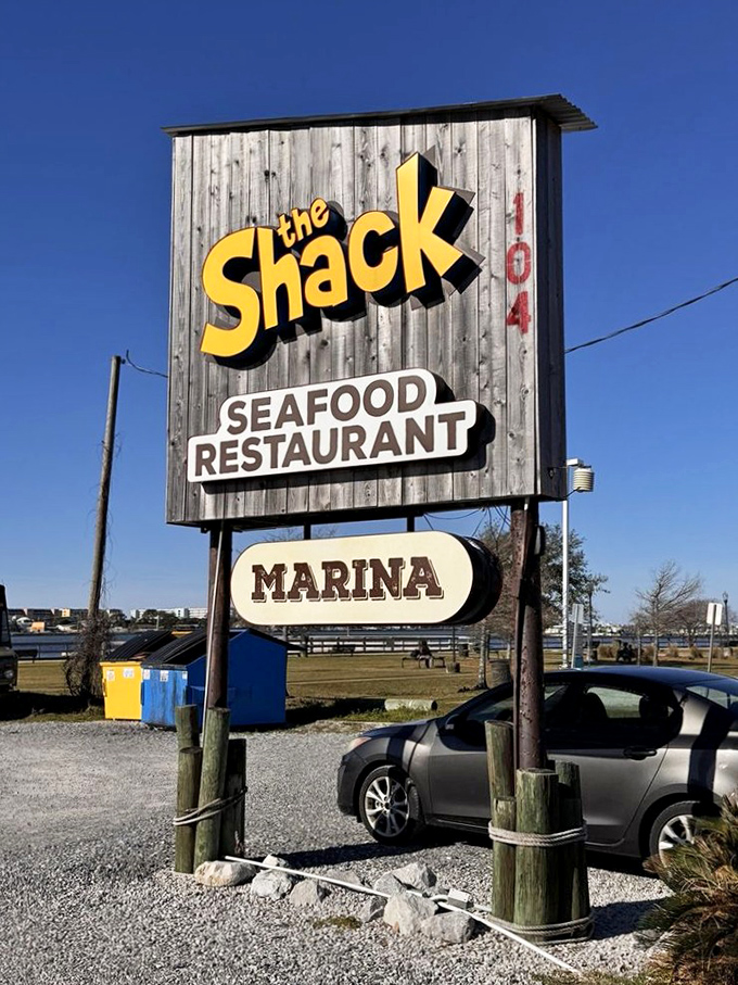 The roadside sign that promises exactly what it delivers: no-nonsense seafood worth making a U-turn for.