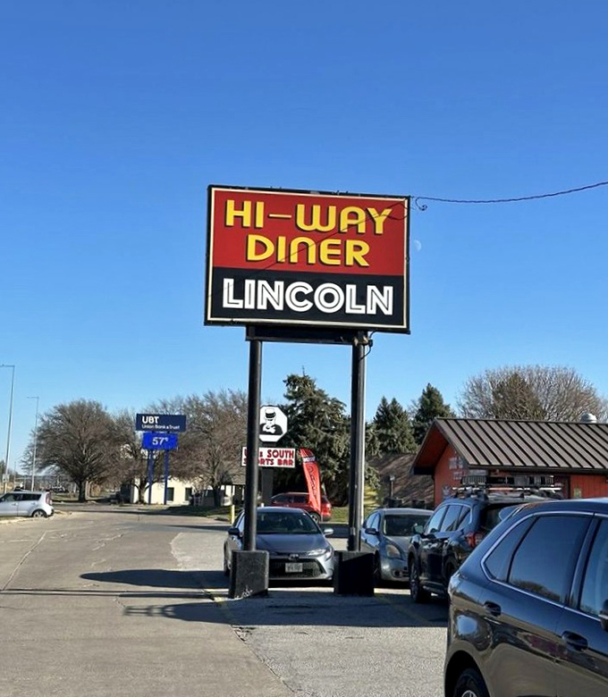 The iconic Hi-Way Diner sign stands tall against the Nebraska sky&mdash;a beacon for hungry travelers and locals seeking honest-to-goodness comfort food.