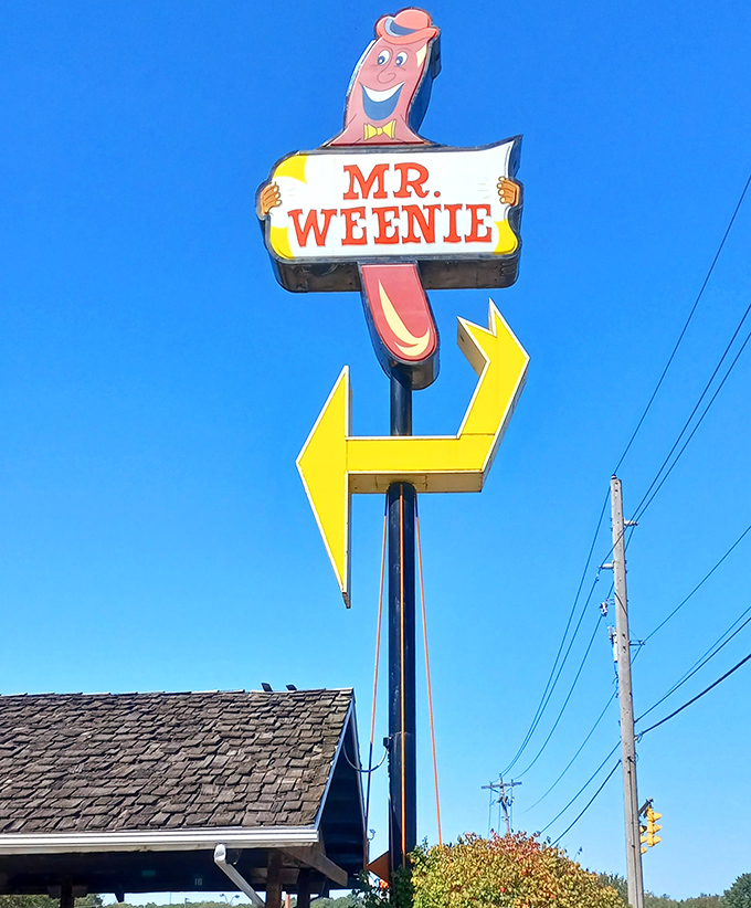 That smiling hot dog mascot isn't just a sign&mdash;it's a local landmark, a friendly face that's been guiding hungry travelers to happiness for generations.
