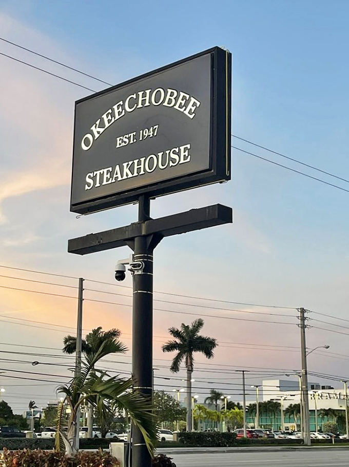 The sign stands as a beacon for beef lovers against the Florida sky, promising a dining experience that's outlasted countless food trends.