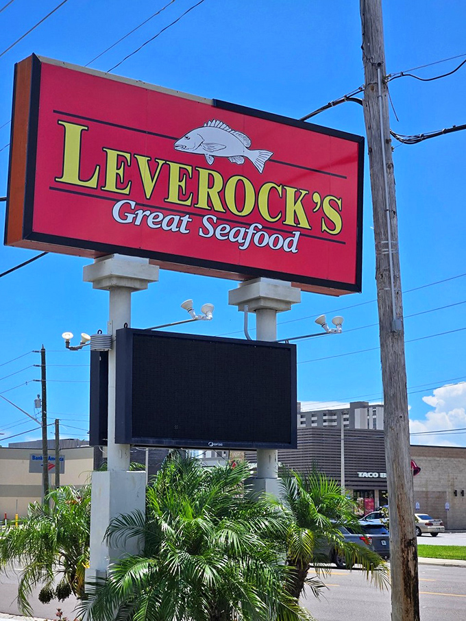 This vibrant fish mural on the exterior wall is your first hint that you've arrived somewhere that takes seafood seriously.