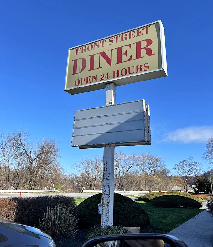 The Front Street Diner sign against a blue Pennsylvania sky&mdash;a beacon of hope for the hungry, the hungover, and the merely hopeful.