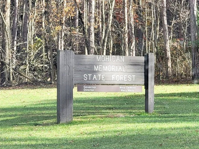 The unassuming entrance sign belies the natural wonderland beyond &ndash; like finding out your quiet neighbor is secretly a rock star.
