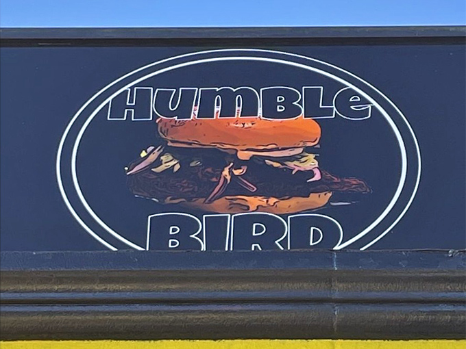 That logo says it all: serious about chicken, humble about everything else. A visual promise of the flavor explosion waiting inside.