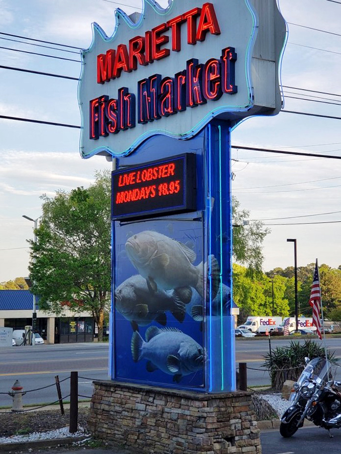 That neon sign doesn't just advertise—it hypnotizes. The "Live Lobster Mondays" message is basically a weekly holiday announcement.