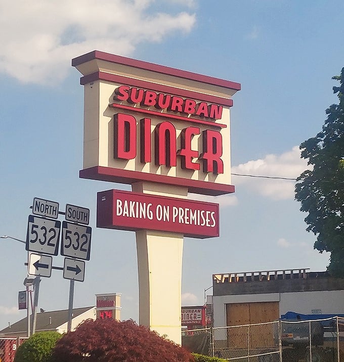 That iconic red signage proudly announces "BAKING ON PREMISES" &ndash; six syllables that translate to "abandon all diets, ye who enter here."