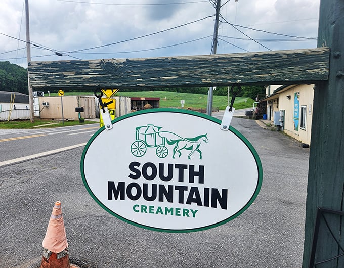 A sign that promises more than directions – it's pointing the way to dairy nirvana with its charming horse-and-cart logo.