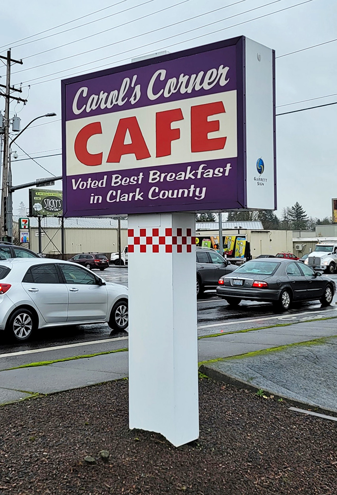The sign that launched a thousand breakfasts. Purple and proud, announcing to Vancouver that yes, this corner is where breakfast dreams come true.