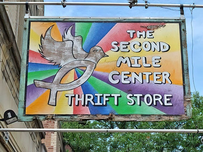 That colorful hand-painted sign above the street announces this secondhand paradise to anyone smart enough to stop by.