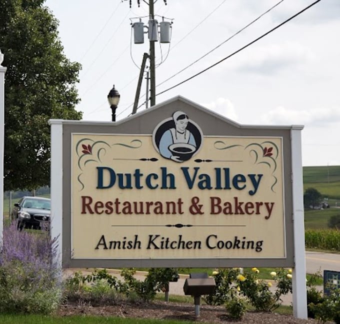 The sign promises "Amish Kitchen Cooking," which is code for "prepare to loosen your belt and cancel your dinner plans."