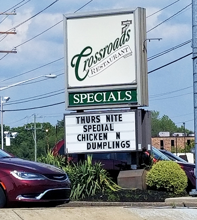 The roadside sign advertising chicken and dumplings proves this kitchen's creativity extends well beyond breakfast hours.