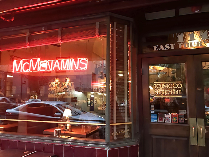 As night falls, the neon signs transform from mere signage to a siren call for those seeking good food, drinks, and company.
