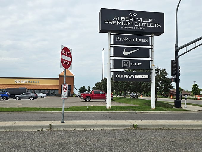 The sign that launches a thousand shopping trips. Like a retail lighthouse guiding bargain hunters safely to the shores of discounted designer goods.