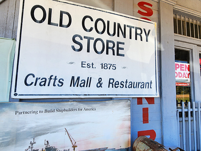 The sign reveals this isn't just any roadside stop – since 1875, The Old Country Store has been serving up history alongside its famous fried chicken.