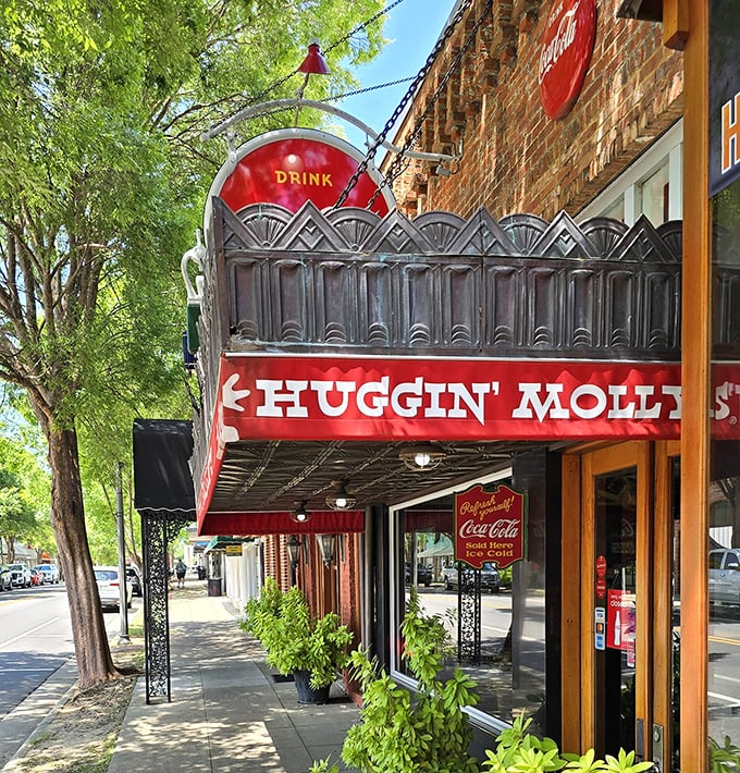 That distinctive ornate metalwork and bold red signage doesn't just mark a restaurant&mdash;it announces a beloved Abbeville institution.
