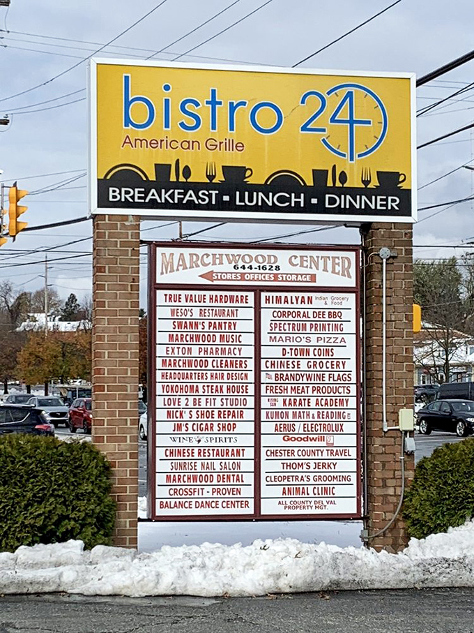 The sign stands tall, beckoning hungry travelers to discover what locals already know.