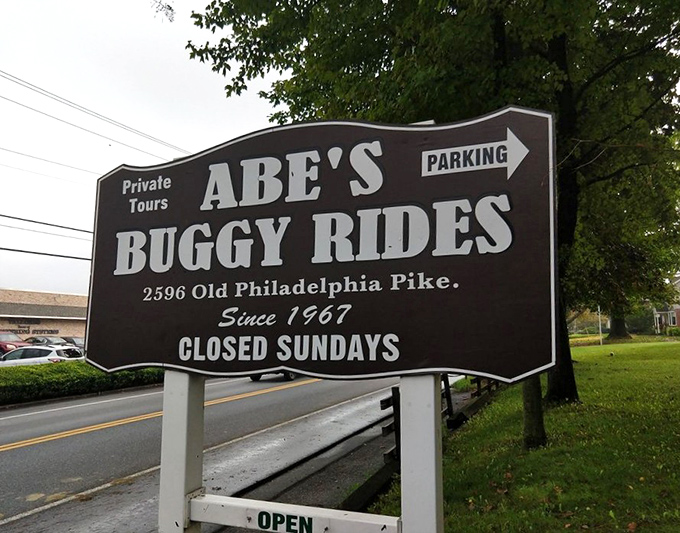 Since 1967, this unassuming sign has welcomed visitors seeking a glimpse into a simpler way of life. Closed Sundays, naturally.
