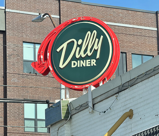 That iconic red and green sign serves as a North Star for breakfast pilgrims. Follow it to find your morning salvation.