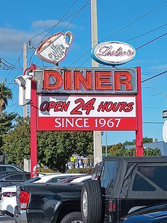 The neon sign promises "Open 24 Hours"&mdash;because hunger doesn't check its watch before making demands.