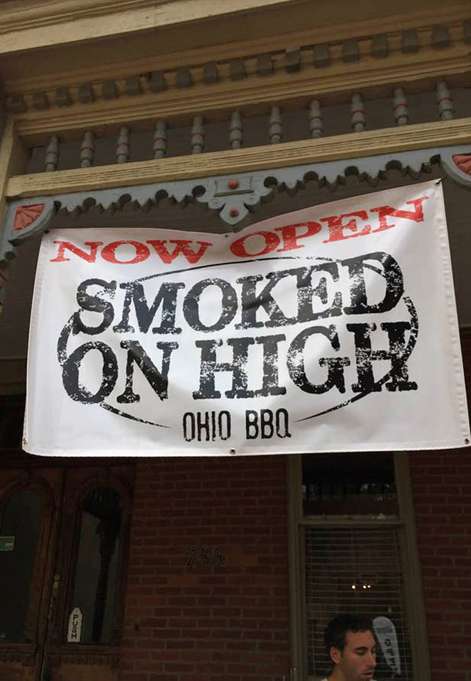 The banner announces "Smoked On High" like a proclamation from meat royalty &ndash; a signal flag for hungry Columbus residents seeking smoky salvation.