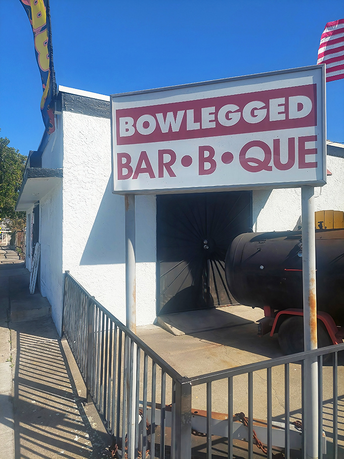 The sign promises "BAR&bull;B&bull;QUE" with such straightforward confidence that you know they're not messing around with anything but the real deal.