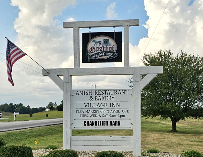 The roadside sign that's guided hungry travelers for generations. Like a lighthouse, but instead of safe harbor, it promises fried chicken.