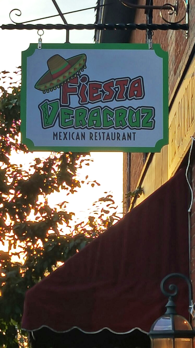 The hanging sign catches golden hour light, promising authentic Mexican flavors. Like a beacon for hungry travelers, it simply says, "Your search ends here."