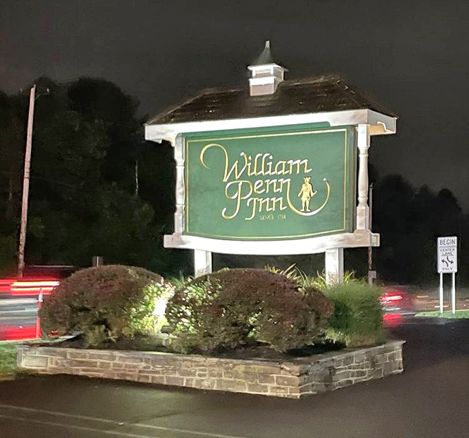 A sign that glows like a beacon in the night, guiding hungry travelers to what might be the Commonwealth's most reliable dining experience since 1714.