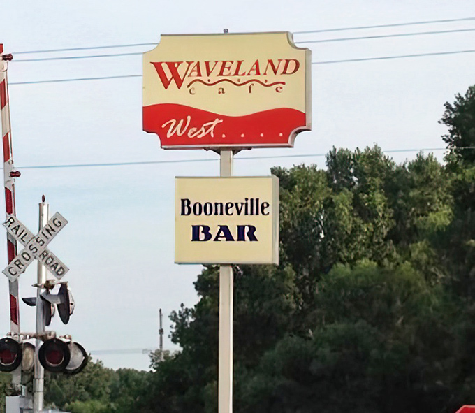 Even the roadside sign has that perfect retro charm, beckoning hungry travelers with the promise of comfort food that transcends trends.